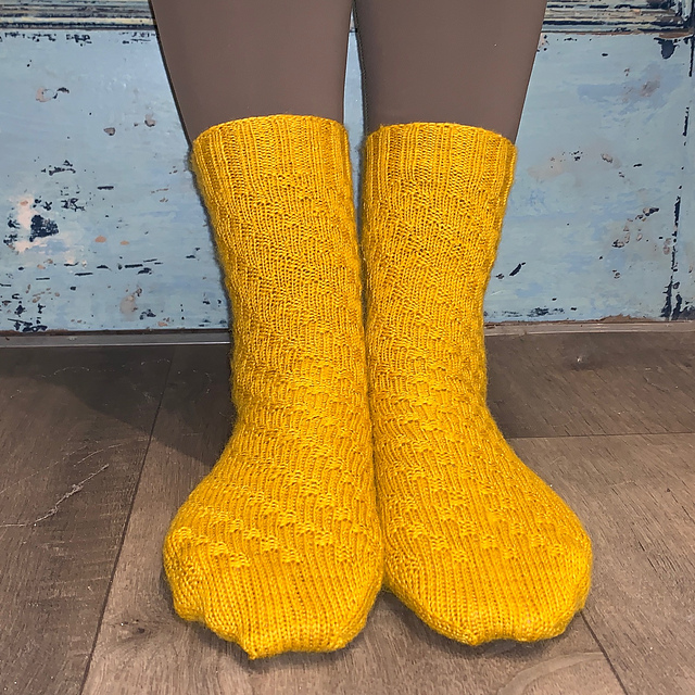 Ravelry: Holly Hock Socks pattern by Peak District Yarns