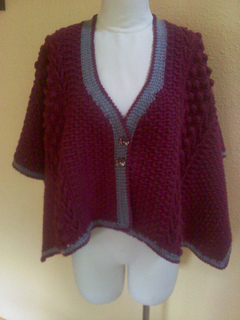 Ravelry: PiggyWiggy96's Rose Aran Toggle Wrap