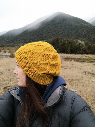 Ravelry: Wavy Cable Hat pattern by Purl Foundry