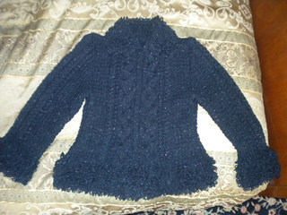 Ravelry: Ritzyknitz's Loopy Cabled Cardigan
