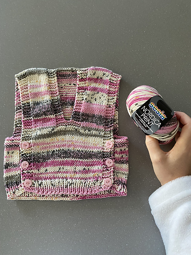 Ravelry: Melika self-patterning yarn baby vest top pattern by marianna mel
