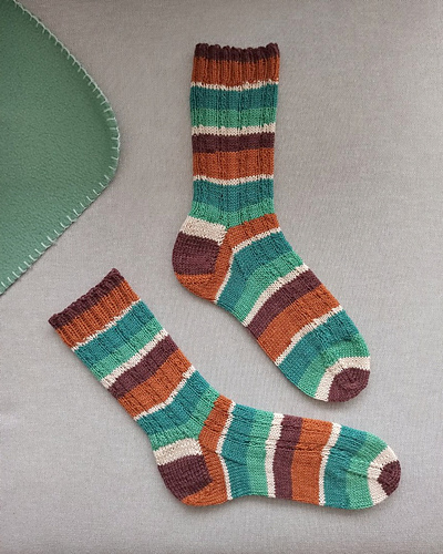 Ravelry: Ladies Mock Cable Socks #616 pattern by Nell Armstrong