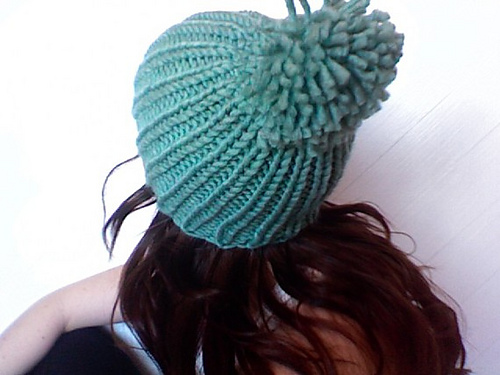 Ravelry: The Power to the Pom Hat pattern by Sara Dudek