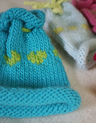 Ravelry: Minnow Merino Bow Tie Tube Hats pattern by Laurie Kimmelstiel