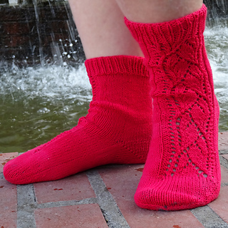 Ravelry: Breathing Fire socks pattern by Red and the Wolf Designs