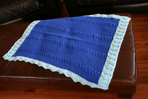 Ravelry: Cable and Garter Stitch Cot Blanket pattern by Leanne Prouse