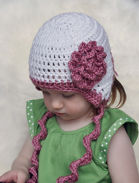 Ravelry: Curly Twirly Tails Ear Flap Hat pattern by Bonnie Potter
