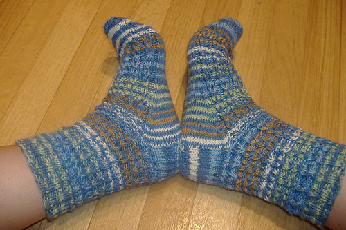 Ravelry: Lacy Mock Cable Socks pattern by ScarlettKnits