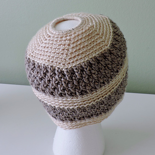 Ravelry: Alternating Posts Messy Bun Hat pattern by Hannah Lewis