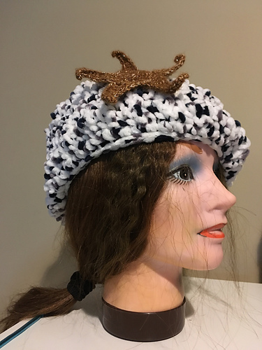 Ravelry: Curly Star Embellishment pattern by Kathryn Cole