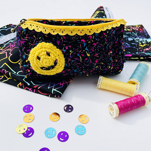 Ravelry: Shell stitch pouch pattern by Alice Tarry