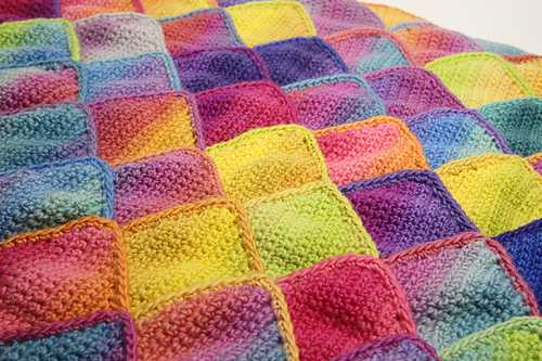 Ravelry: Bright Dragon Scales Blanket pattern by Jess Mason