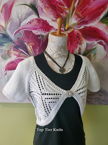 Ravelry: Vaulted Lace Shrug pattern by Top Tier Knits