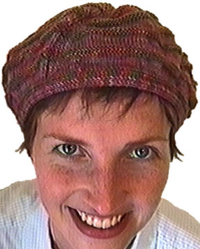 Ravelry: Reversible Rotating Ridge Hat pattern by Traci Bunkers