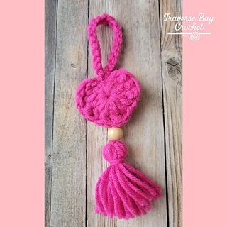 Ravelry: Heart Bag Charm pattern by Laura Brian