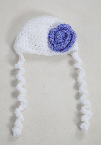 Ravelry: Hat with Twisted Tails pattern by Thomasina Cummings Designs