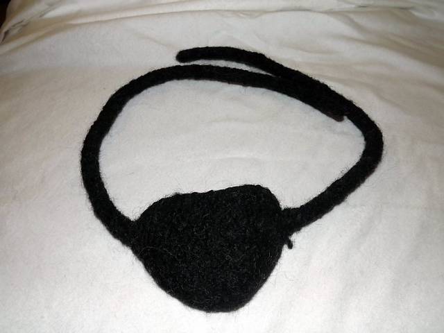 Ravelry: A Felted Eye Patch pattern by Jen Kubeck