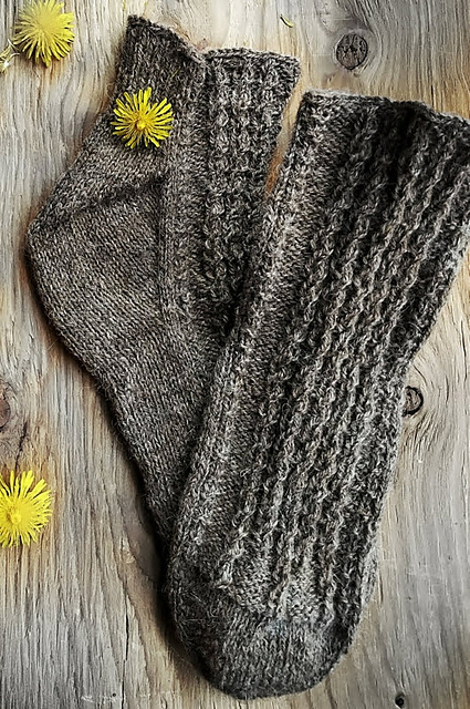 Ravelry: Cabled Viking Socks pattern by Daki De Alwis