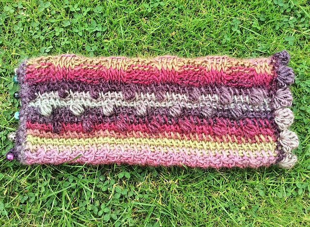 Ravelry: Tunisian Twiddle Muff pattern by Jane Bass