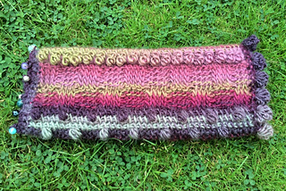 Ravelry: Tunisian Twiddle Muff pattern by Jane Bass