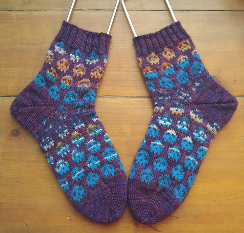 Ravelry: Polka Dot Skull Socks pattern by Strangecat Design