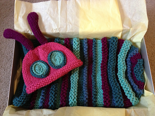 Ravelry: Hungry Caterpillar Baby Cocoon and Hat pattern by Angie Hartley