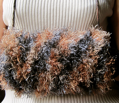 Ravelry: Knitted Mitted Muff pattern by Linda Lehman