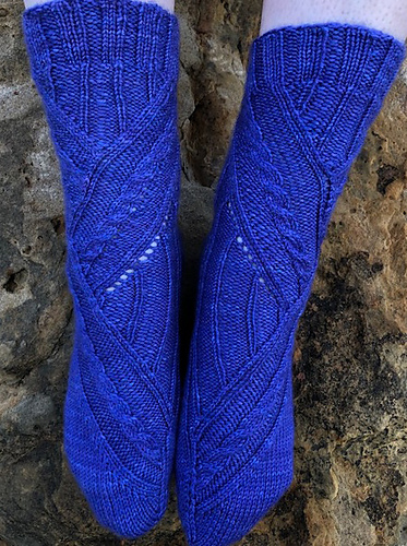 Ravelry: Clash of Cables Socks pattern by Anye M. Shafer