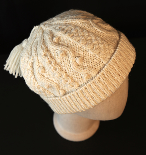 Ravelry: Tasseled Aran Hat pattern by Jennifer Kent