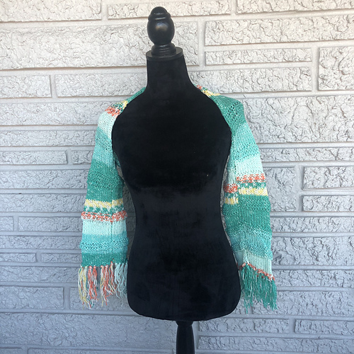 Ravelry: Minty Fringe Shrug pattern by Loom Knit Designs with BOHLD