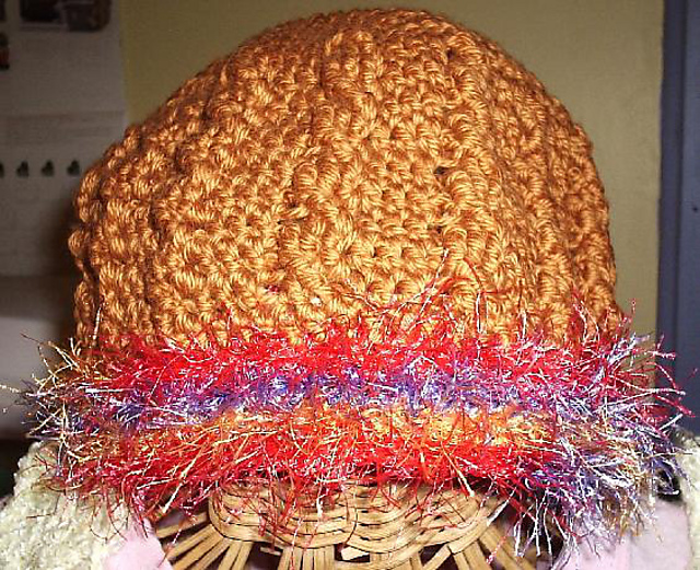 Ravelry: Cabled Fur Hat pattern by Celeste Dunn