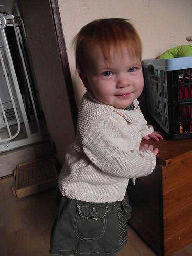 Ravelry: Moss Stitch Cardigan with Bow pattern by Sirdar