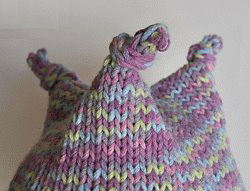 Ravelry: Tri-Cornered Baby Hat pattern by Cathy Campbell
