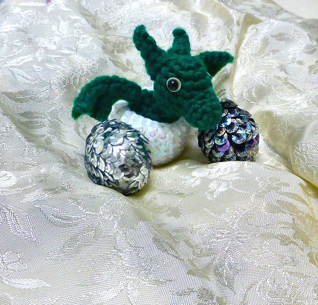 Ravelry: Crochet Dragon Eggs with Baby Dragon pattern by Christine Nast