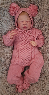 Ravelry: danelle1977's Cabled Romper for Alison