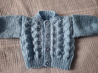 Ravelry: Noah Newborn Cardigan pattern by Cheryl Daley