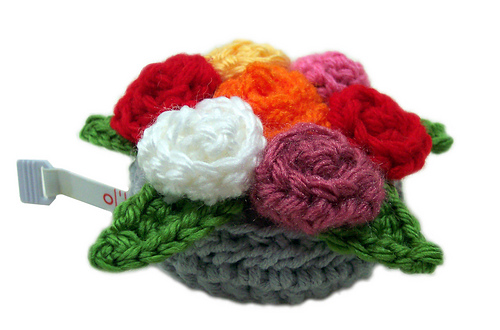 Ravelry: Rosette Tape Measure Cover pattern by Claudia Lowman