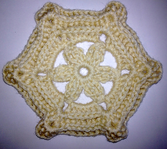 Ravelry: Raised Flower Hexagon pattern by Sylvia Cosh and James Walters