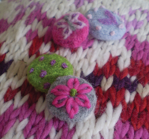 Ravelry: tiny felty badges pattern by Claire Garland