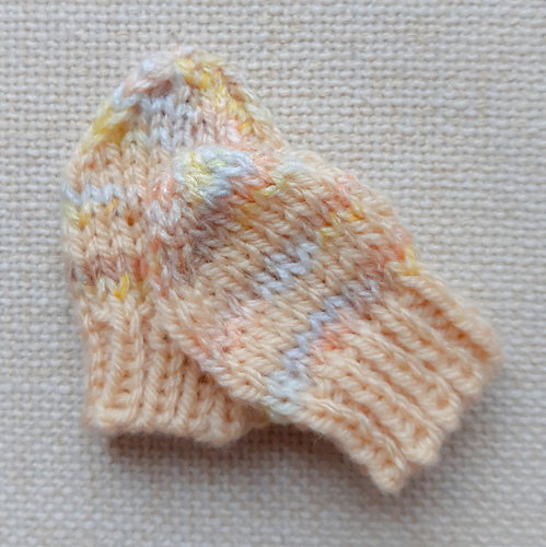 Ravelry: Mittens for Doll pattern by Esther Kate