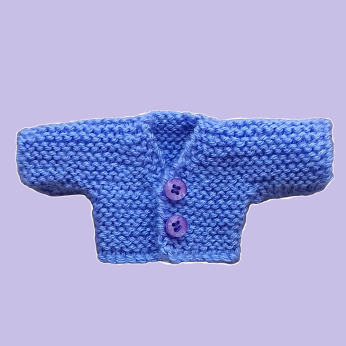 Ravelry: Lavender Cardigan for Doll pattern by Esther Kate