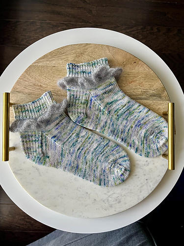 Ravelry: Soft Ruffle Socks pattern by Allison Schmidt