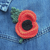 Ravelry: Poppy Brooch pattern by Amanda Berry