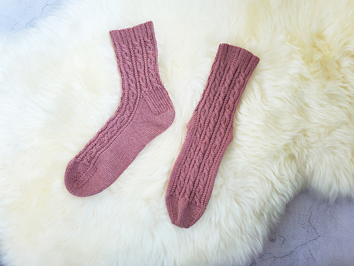 Ravelry: Rococo cable Socks pattern by Sangmi Lee