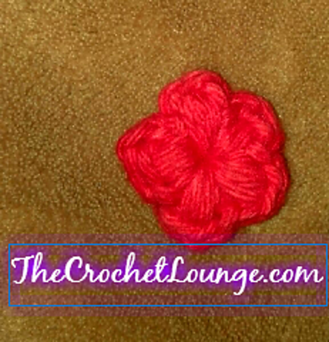 Ravelry: Star Flower Puffs pattern by "e" Lee