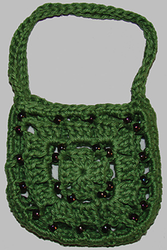 Ravelry: Beaded Mini Bag pattern by Shannon Johnson