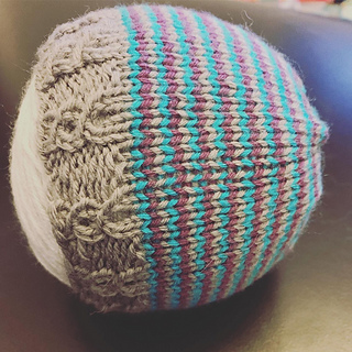 Ravelry: Cabled Brim Helix Hat pattern by East Coast Knits