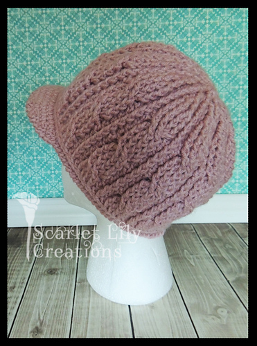 Ravelry: Cabled Hat with Brim pattern by Jamie Huisman