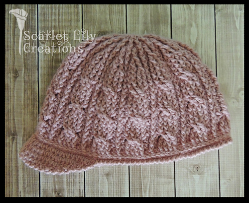 Ravelry: Cabled Hat with Brim pattern by Jamie Huisman