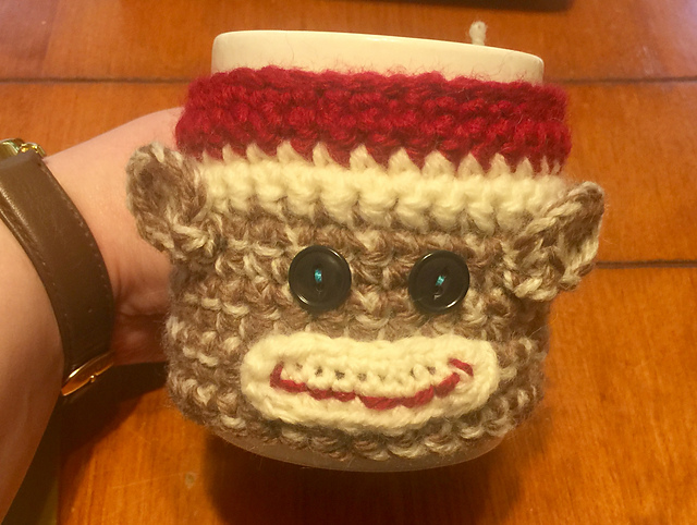 Ravelry: Sock Monkey Mug Cozy pattern by Jen Coym